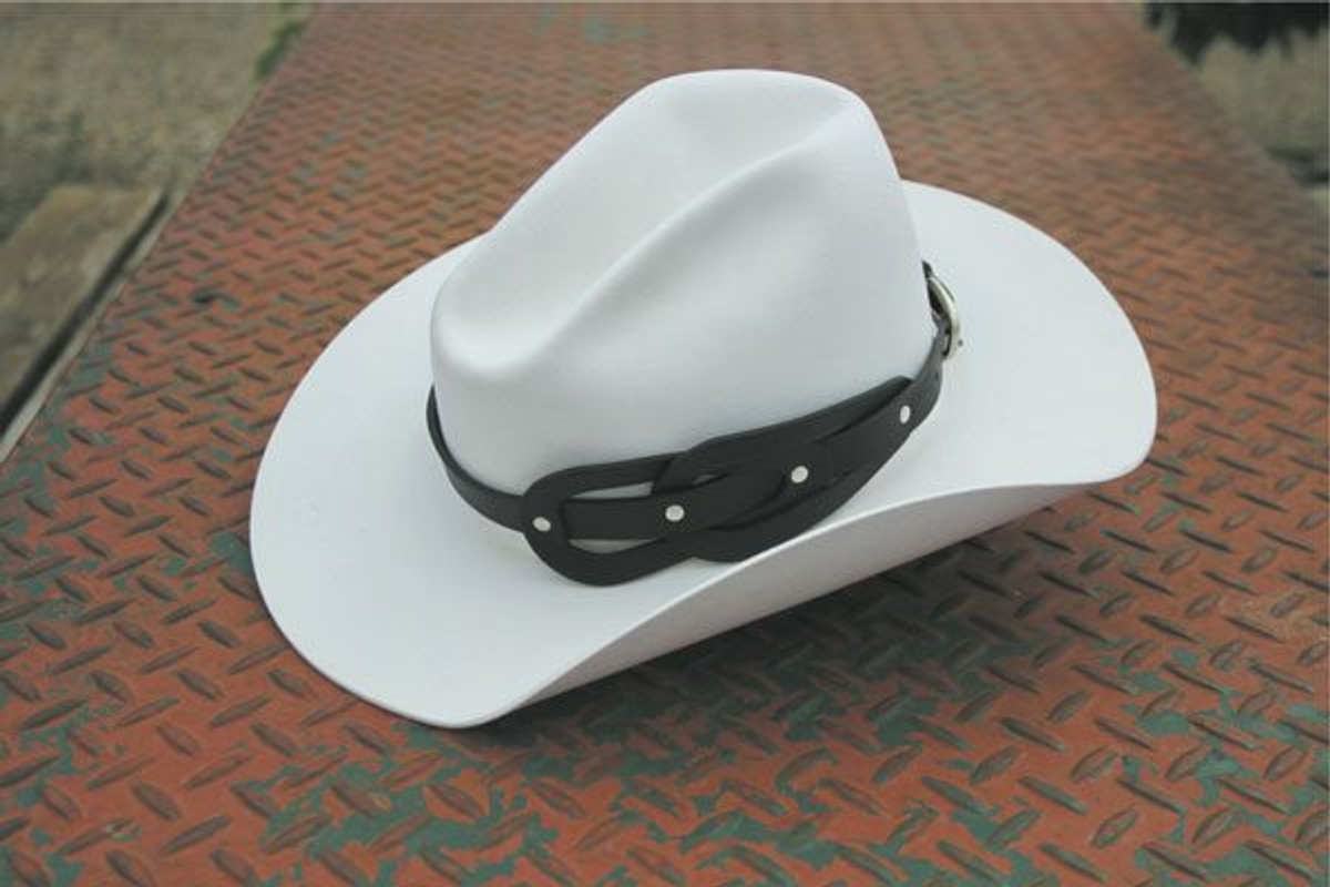 Paul Hardy's special edition Calgary Stampede white hat is super swanky ...