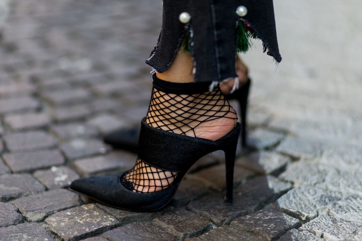 How To Wear Fishnets Like a Street Style Superstar - FASHION Magazine
