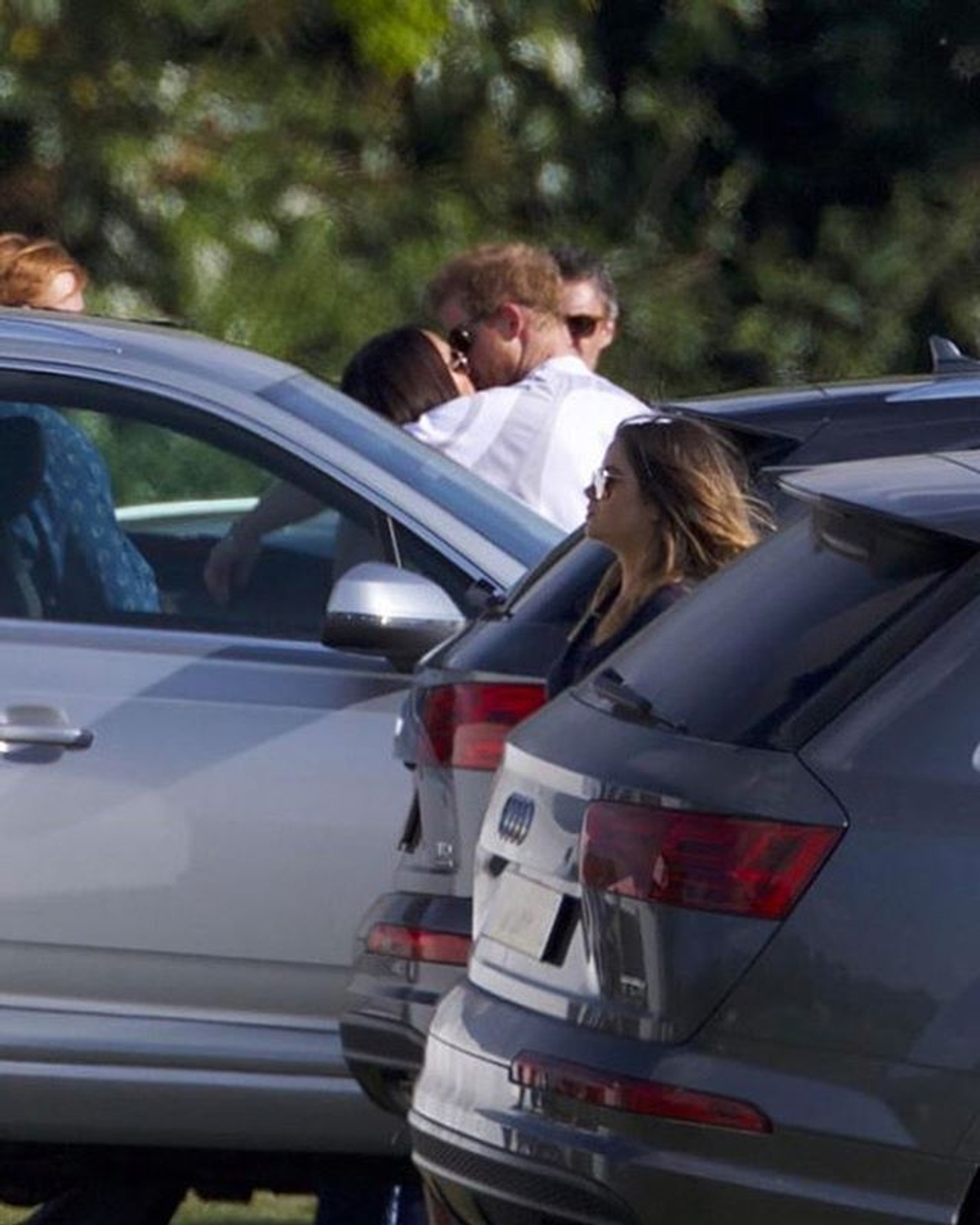 Meghan Markle and Prince Harry Share a Kiss at Their First Public ...